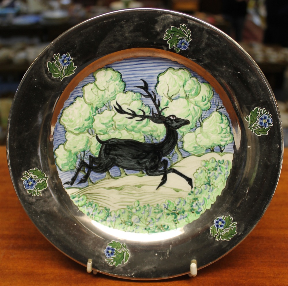 A pair of Wedgwood Arts & Crafts silver lustre pottery plates by Alfred ...