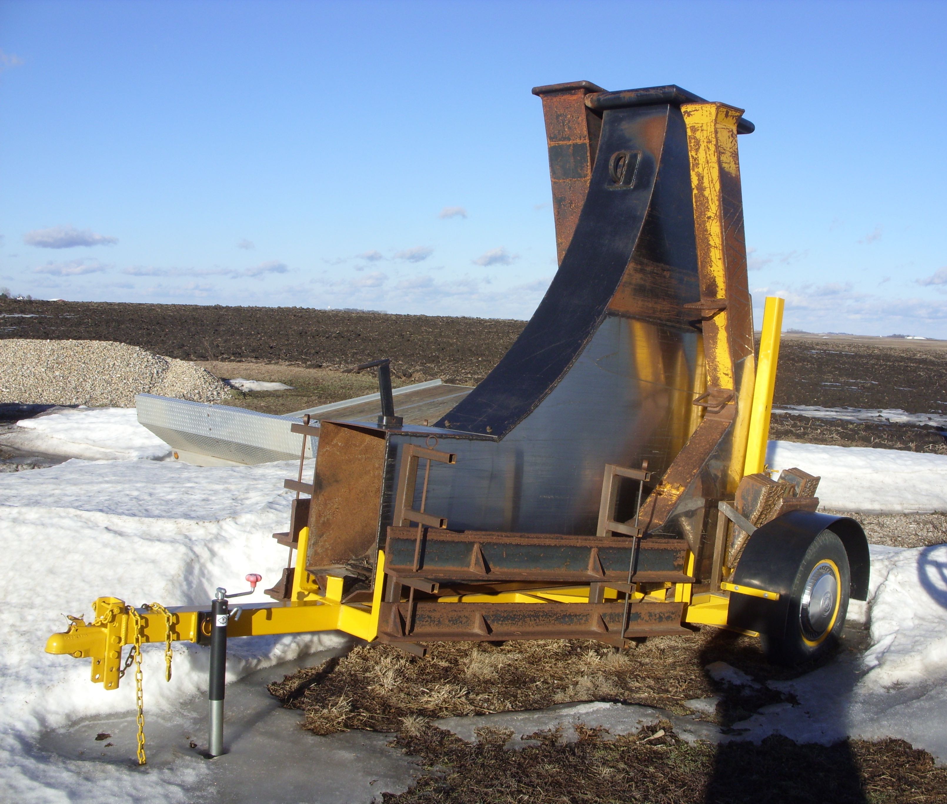 4", 8", & 12" tile boots for tile plow on single-axle trailer