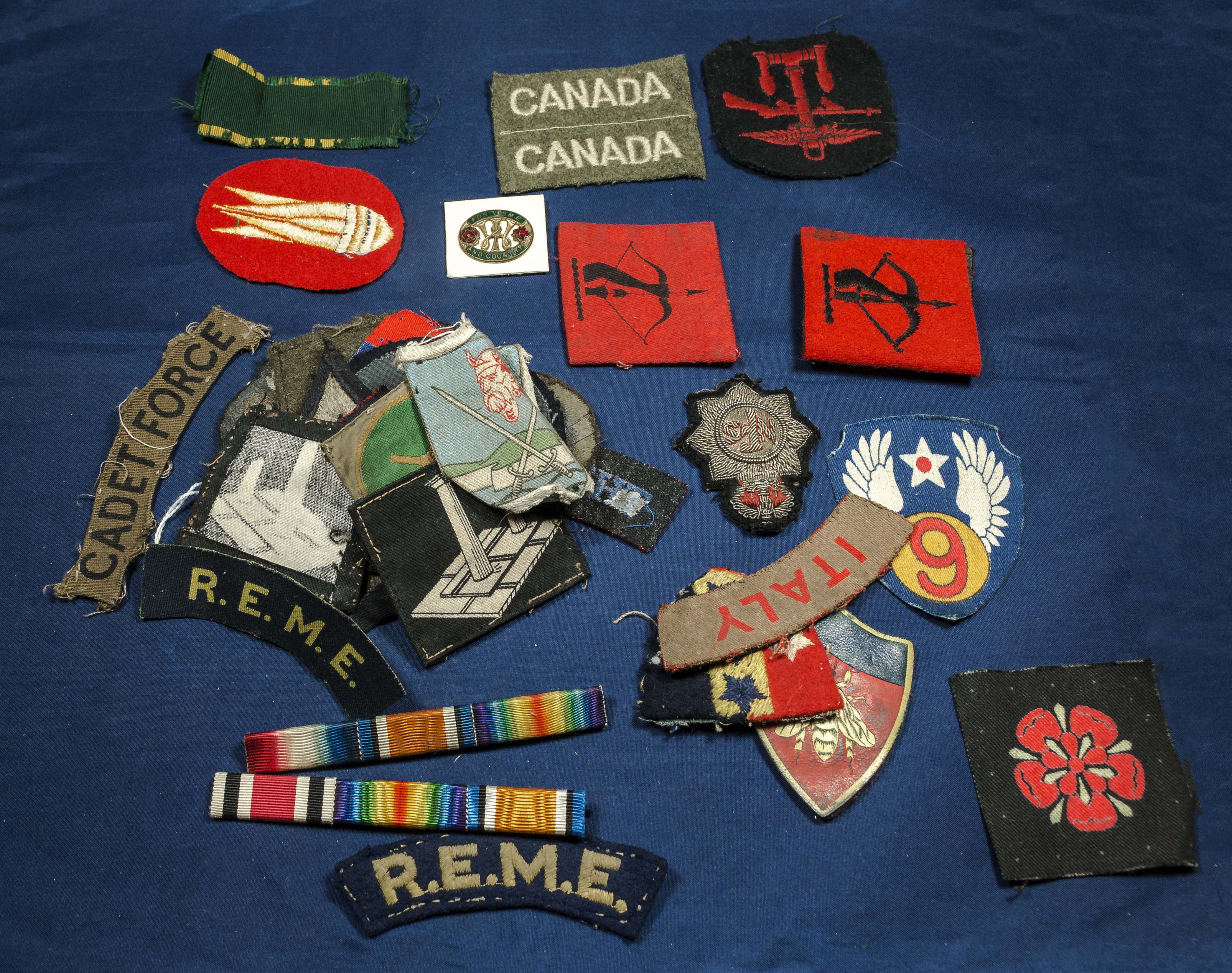 A collection of cloth badges