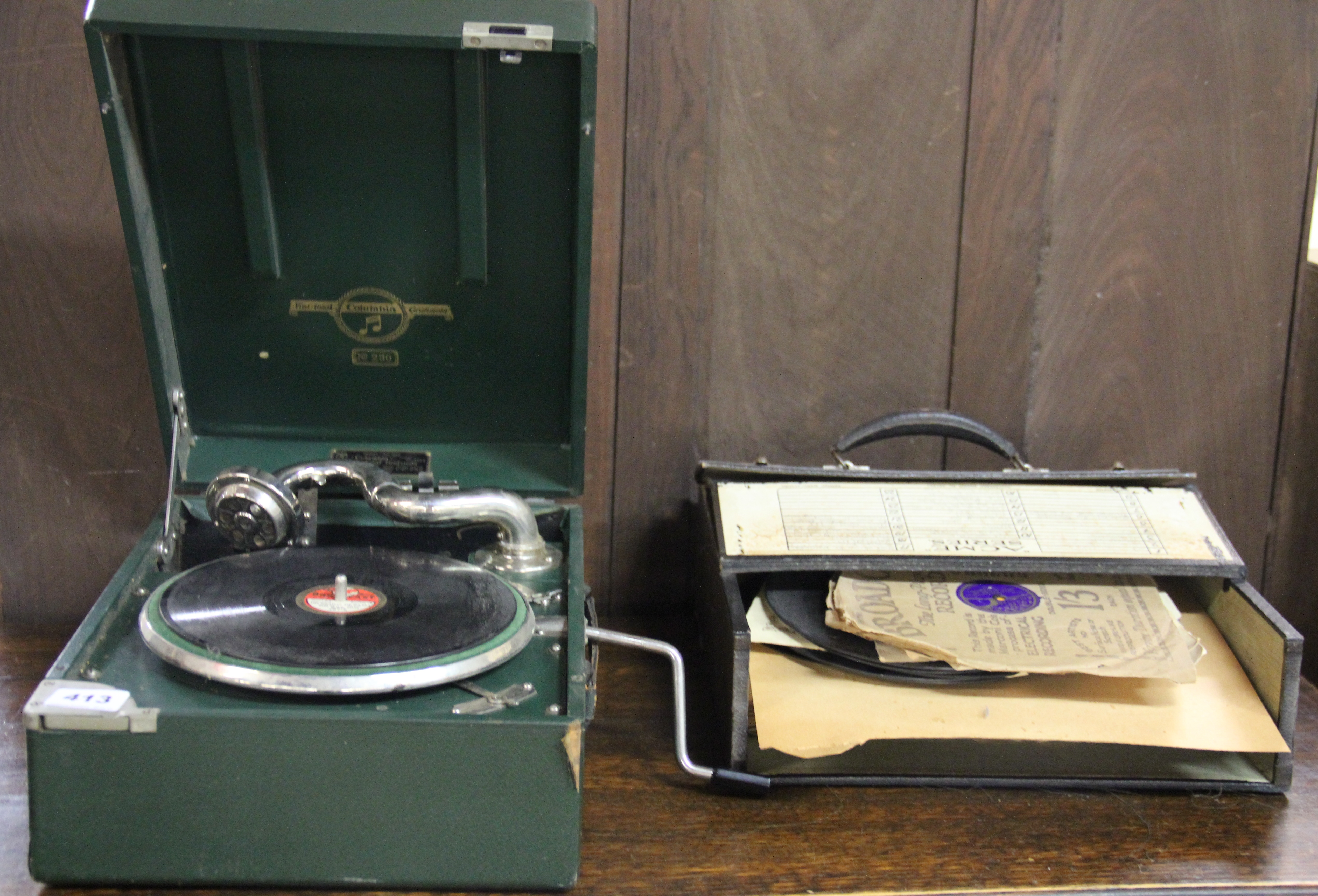 A Columbia portable record player and 78 rpm records.