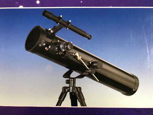 A boxed Science Tech 675x reflector telescope