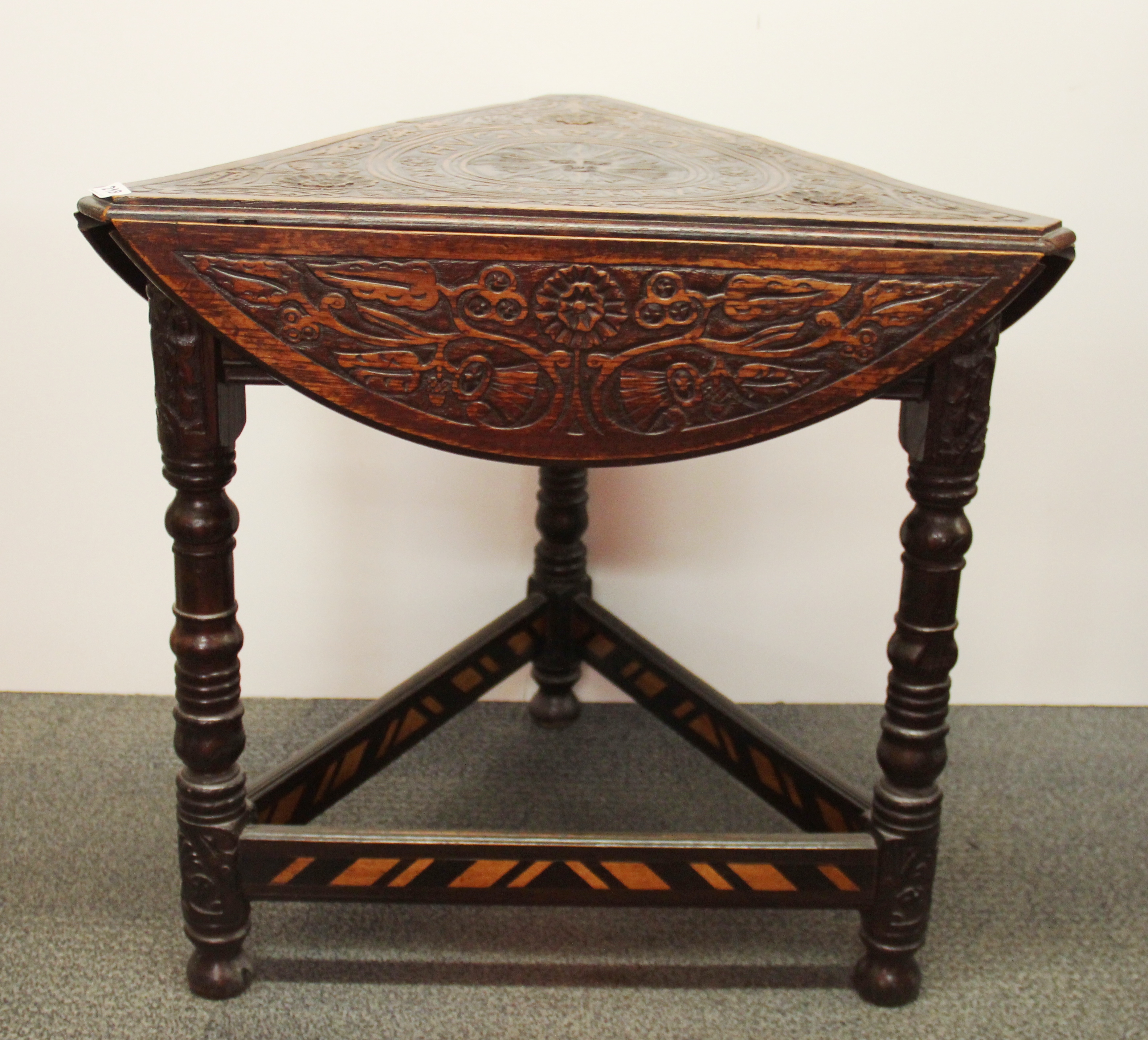 An interesting English 18th Century carved oak triangular side table ...