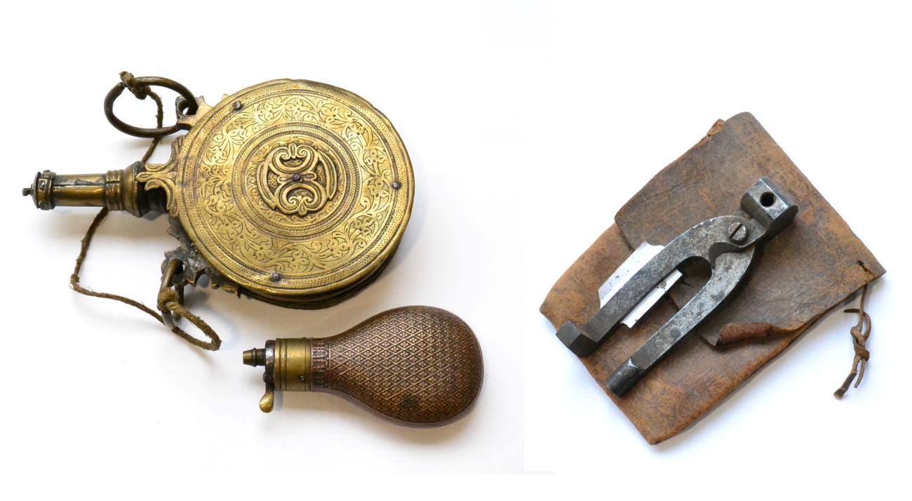 A 17th Century North European Brass Powder Flask, of circular form ...