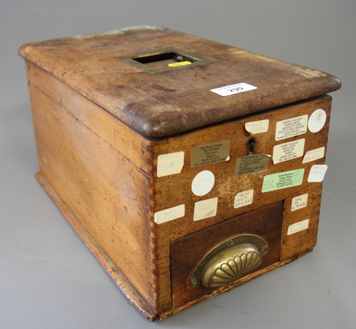 A vintage wooden cash till