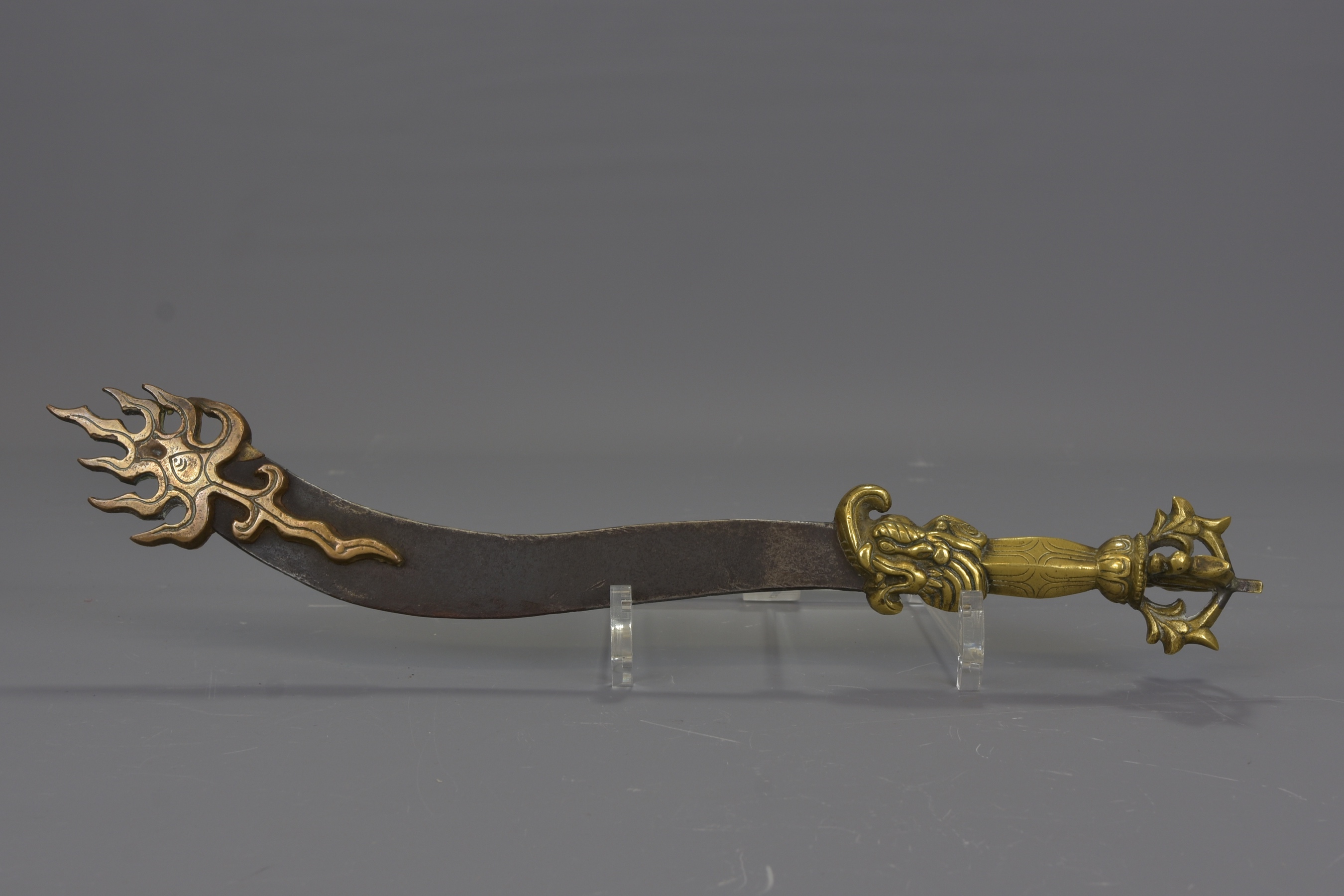 A Tibetan 19th century bronze Buddhist vajra sword. 36cm length