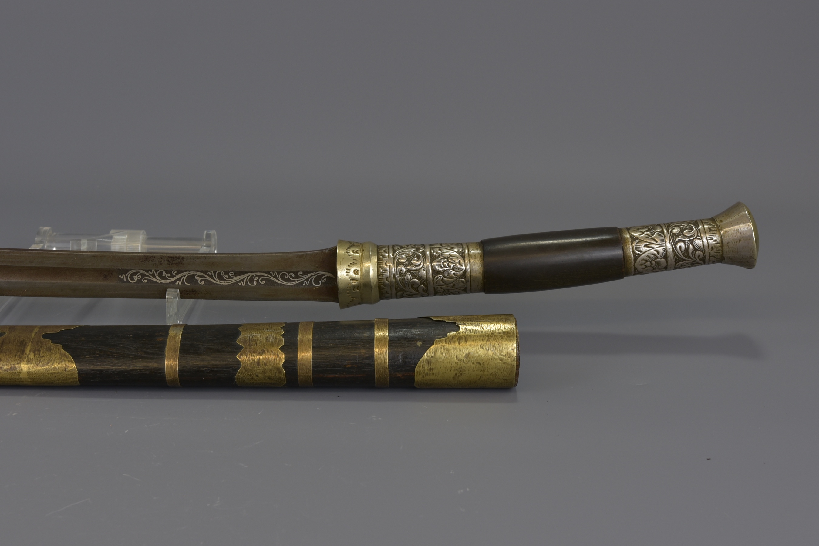 A Thai 18/19th century long sword with original wooden sheath. 85cm long