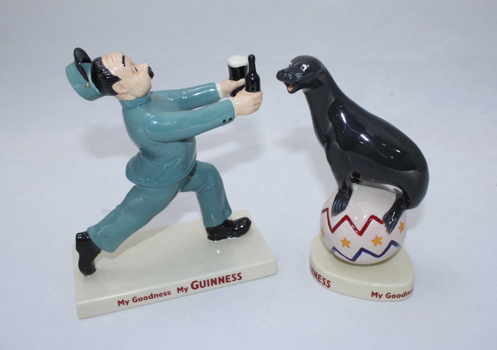 Coalport limited edition Guinness figurines 'Zoo keeper' and 'Sea lion ...