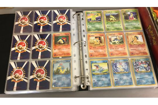 Two Pokemon Trading Card folders, full of Pokemon cards. The first ...