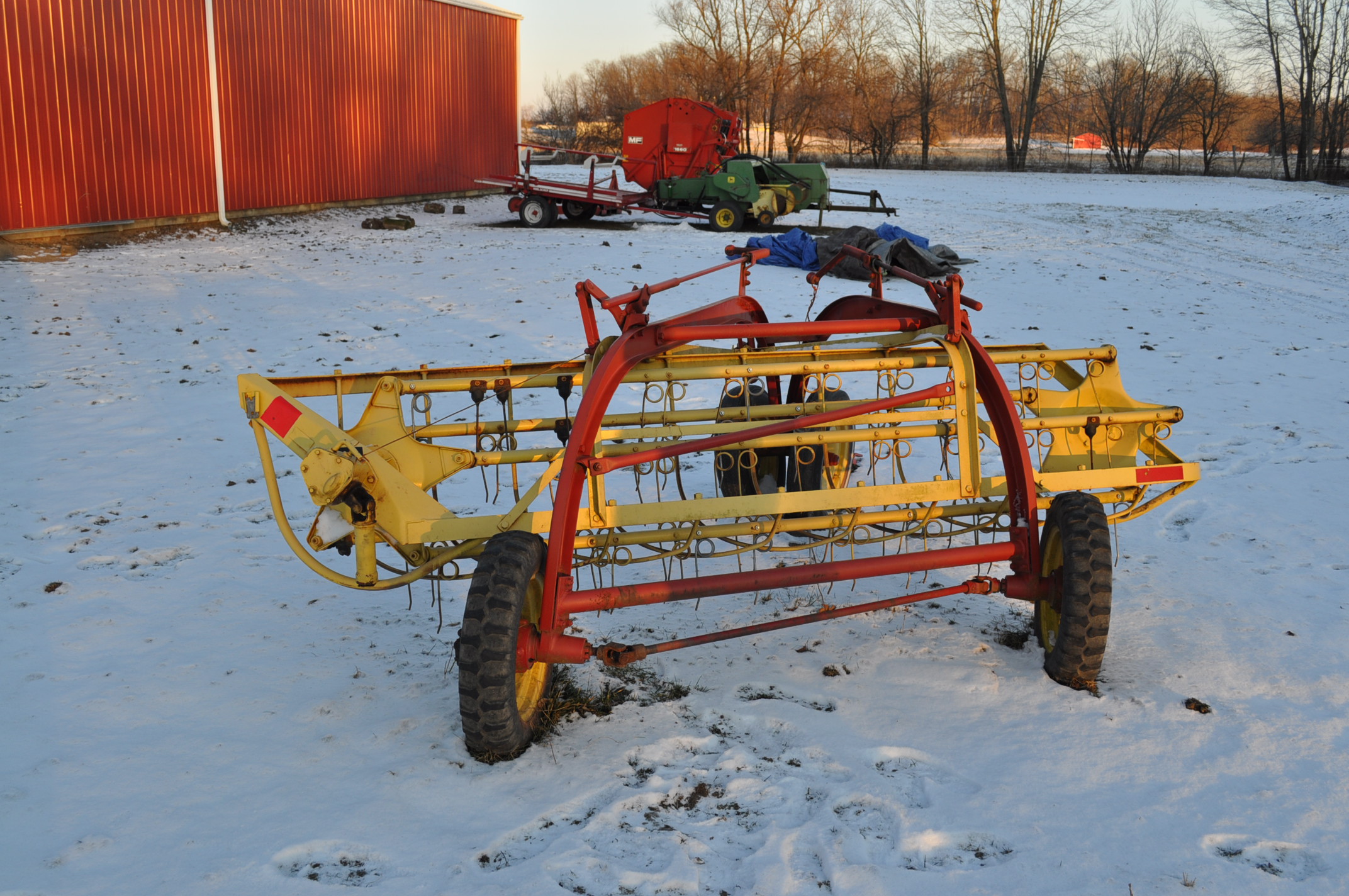 New Holland 56 Rolabar hay rake, 5 bar, dolly wheel, ground drive