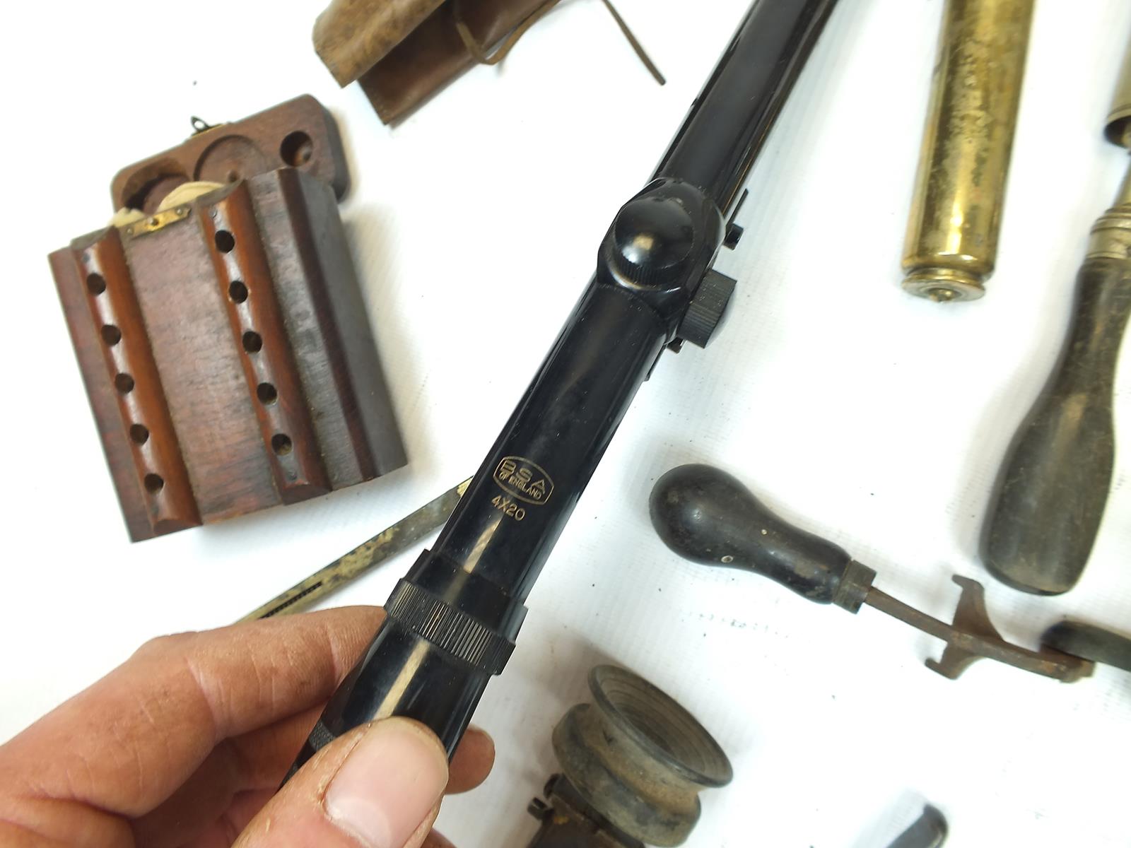 A BRASS PERCUSSION CAP DISPENSER, together with a large quantity of ...