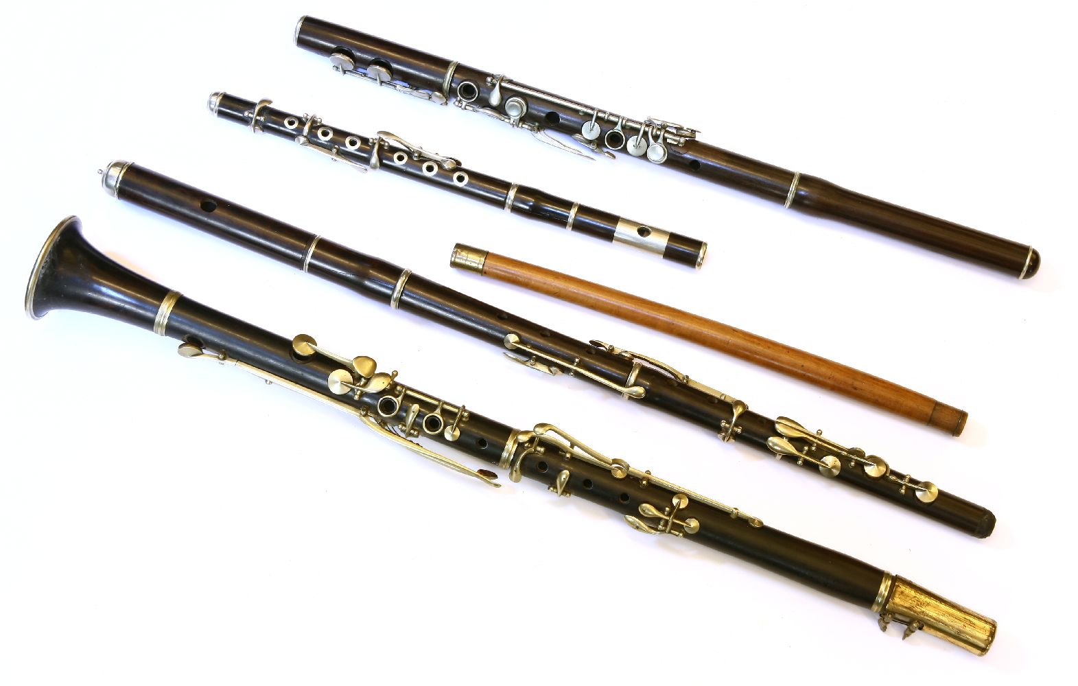 A collection of 19th Century woodwind musical instruments, to include a ...