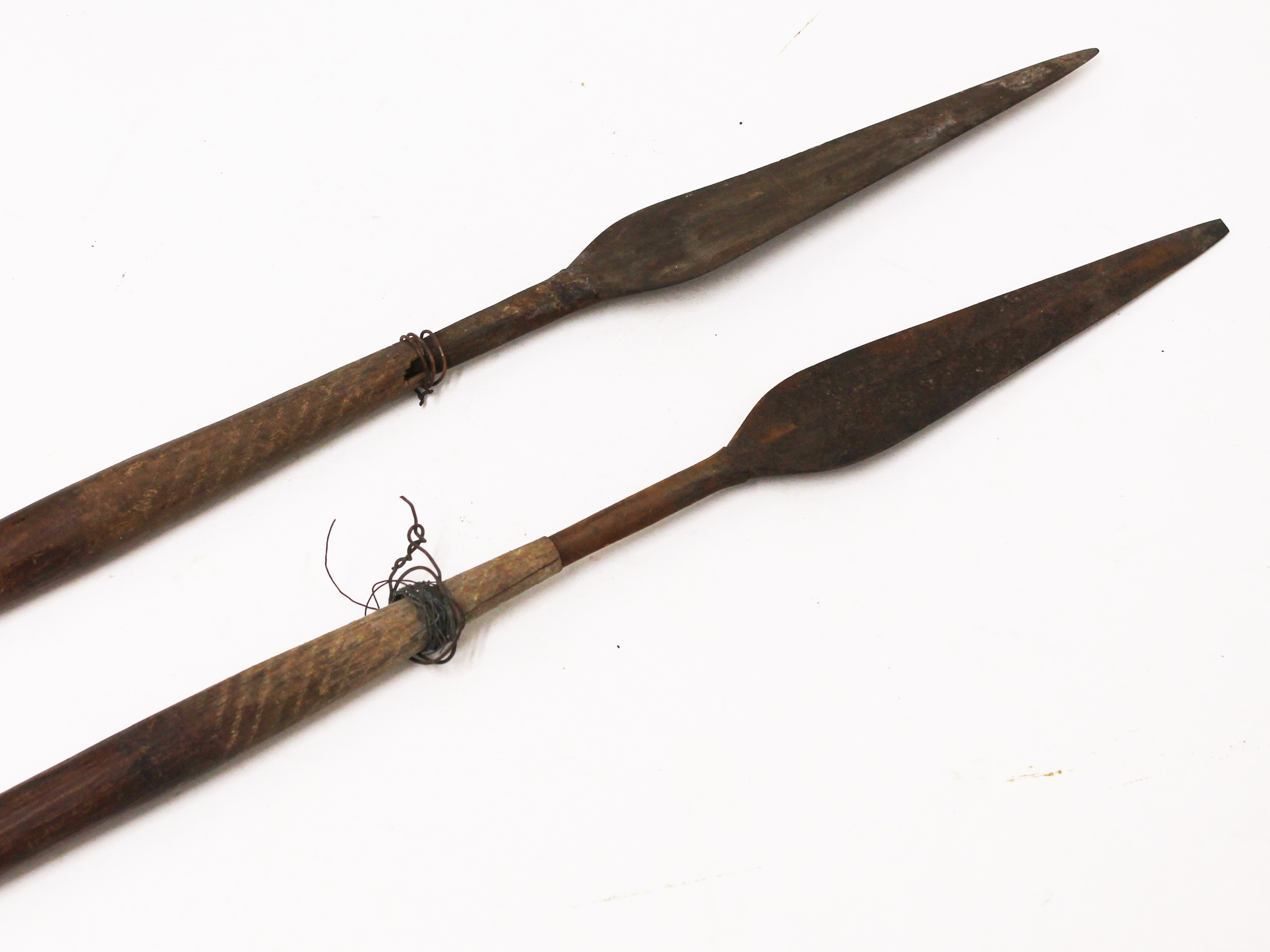 Two Zulu Iklwa(?) stabbing spears, length 119cm each. Condition ...