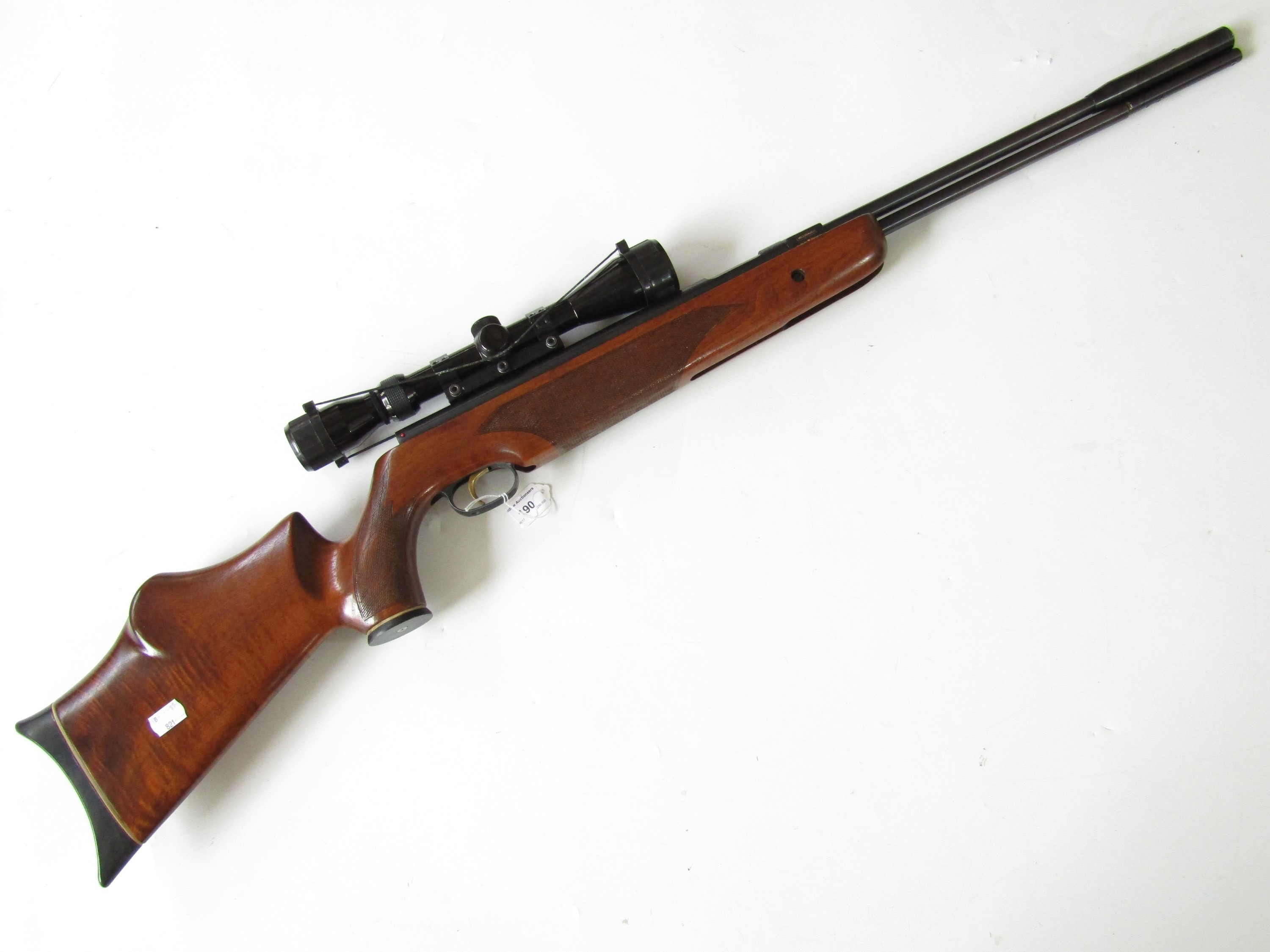 A Weihrauch HW77K .177 calibre air rifle with telescopic sight
