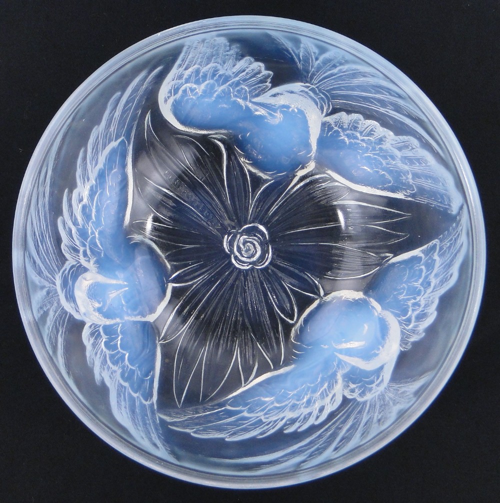 A Jobling glass moulded vaseline glass bowl, with relief design of ...