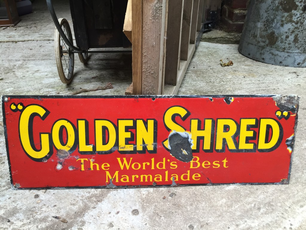30" x 10" Golden Shred enamel sign