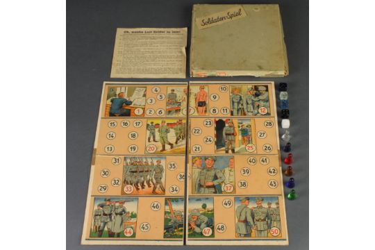 A Second World War Nazi German board game Soldaten-Spiel comprising ...