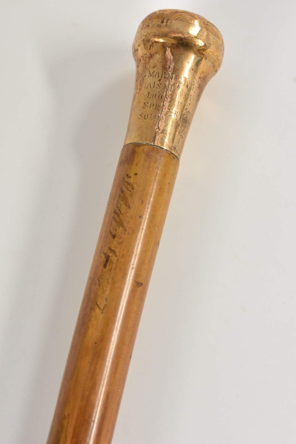 A George V 9ct gold mounted military officer's walking cane, the domed ...