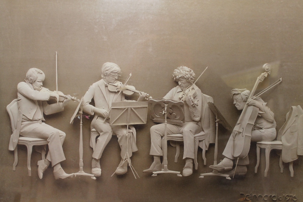 A FRAMED AND GLAZED REINHARD PRINT DEPICTING A THREE DIMENSIONAL ORCHESTRA
