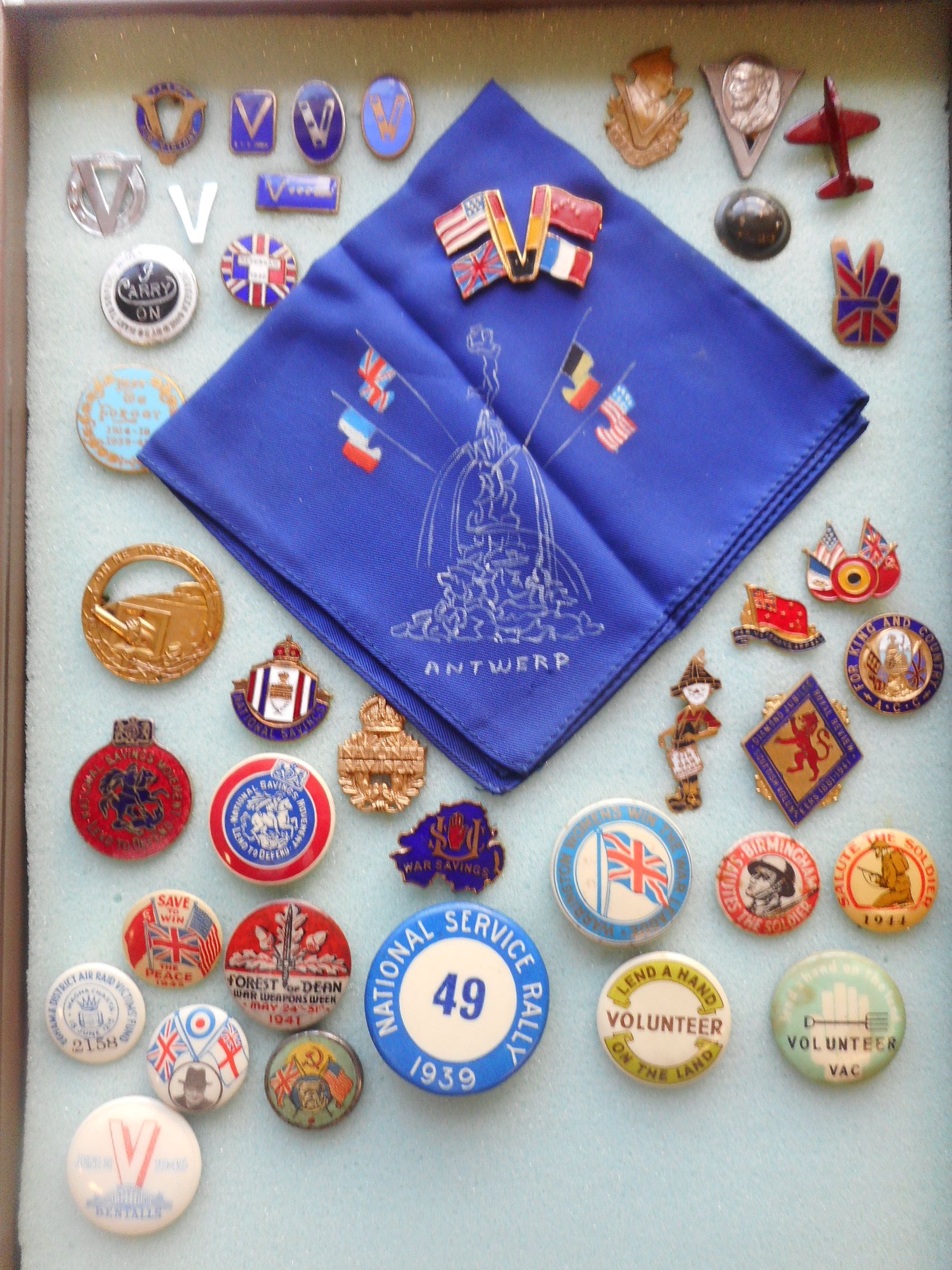 A collection of World War Two period patriotic lapel badges: including ...