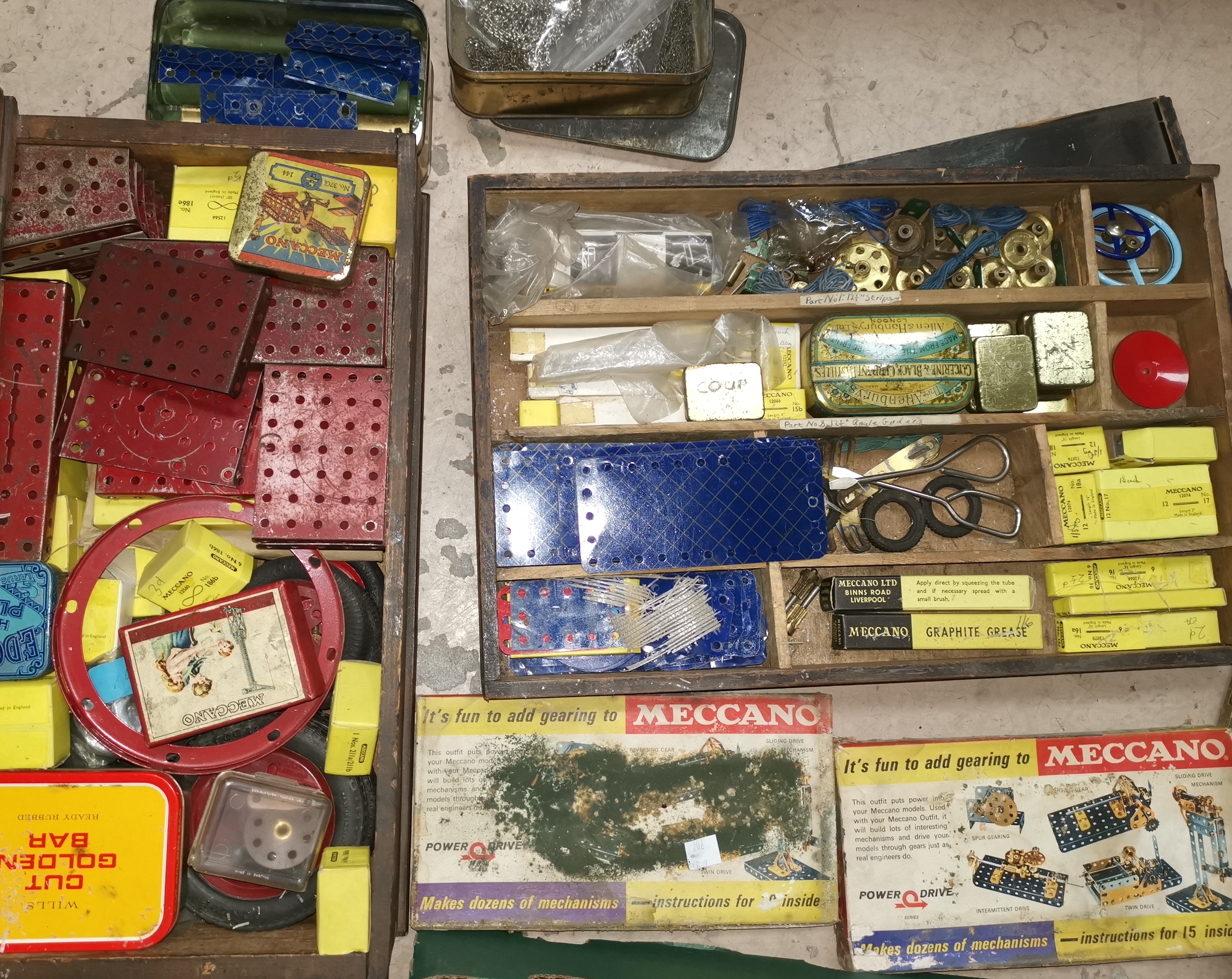 A large collection of Meccano parts, including originally packeted ...