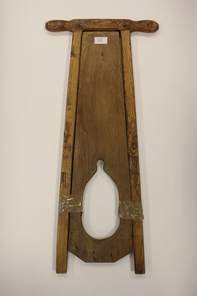A vintage wooden Boot puller.