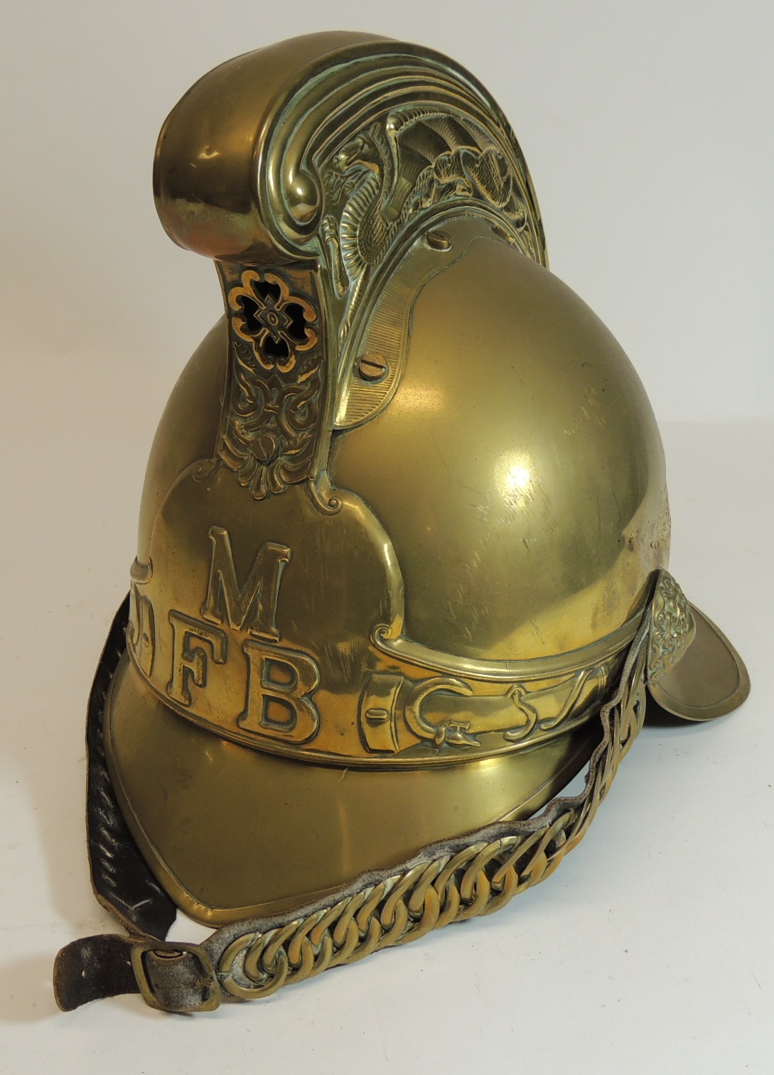 A Rider & Bell "Merryweather" brass firemans helmet for the ...