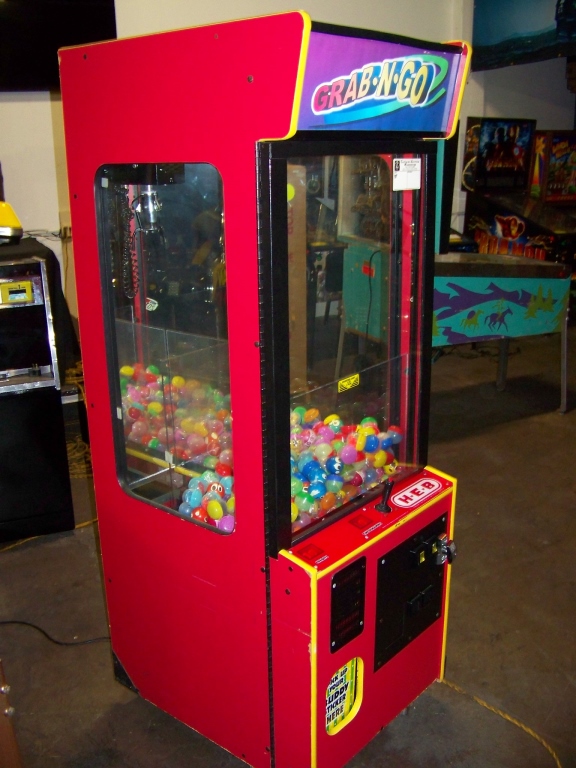 GRAB N GO PLUSH CLAW CRANE MACHINE Item is in used condition. Evidence ...
