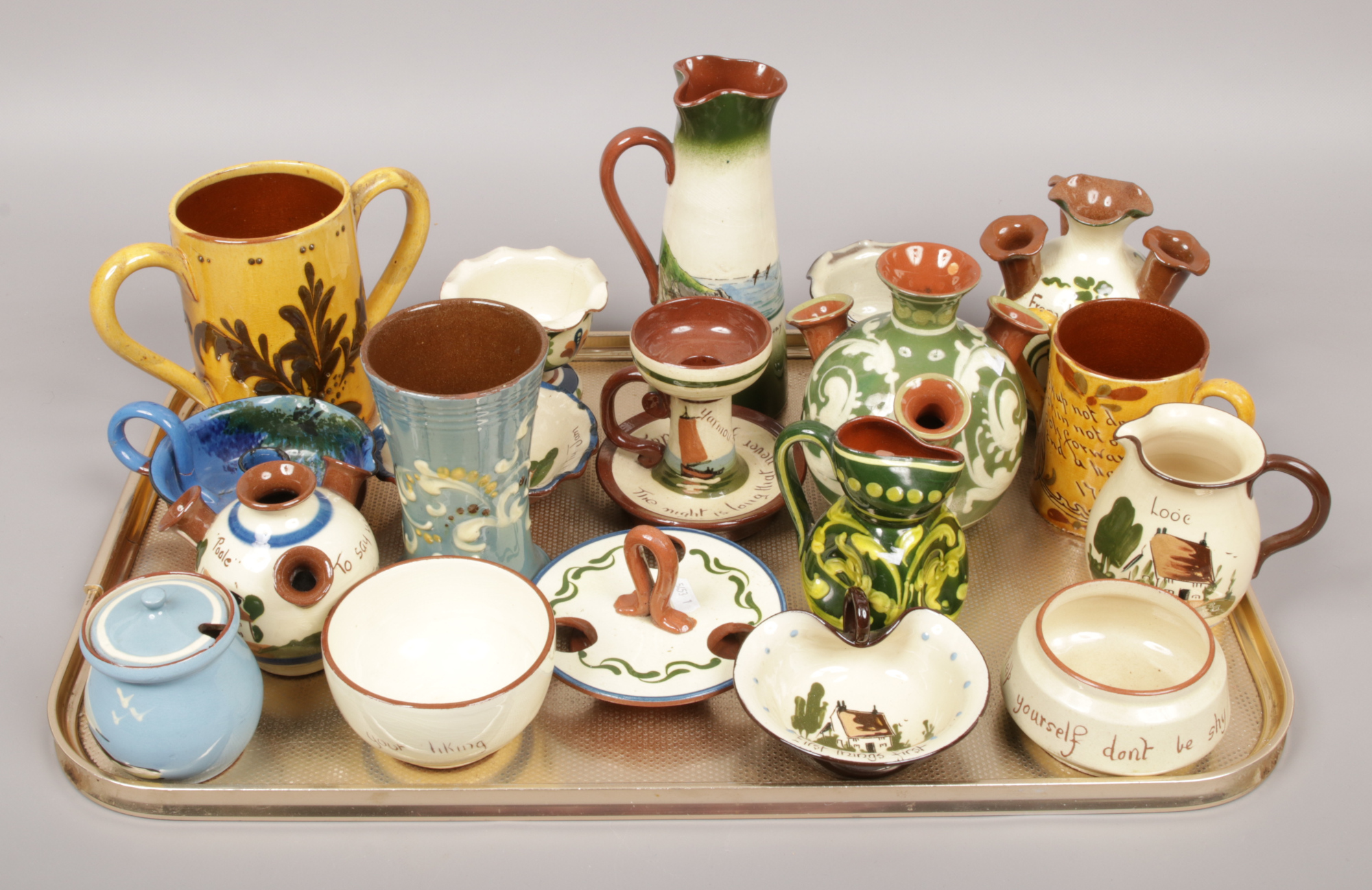 A tray of mostly Torquay ware pottery to include jugs, vase, specimen ...