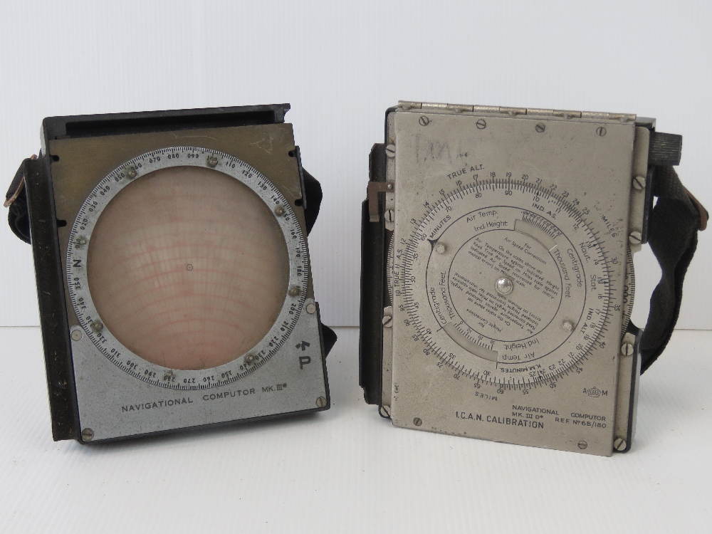 Two RAF navigational computers mark III, one marked with Broad Arrow ...