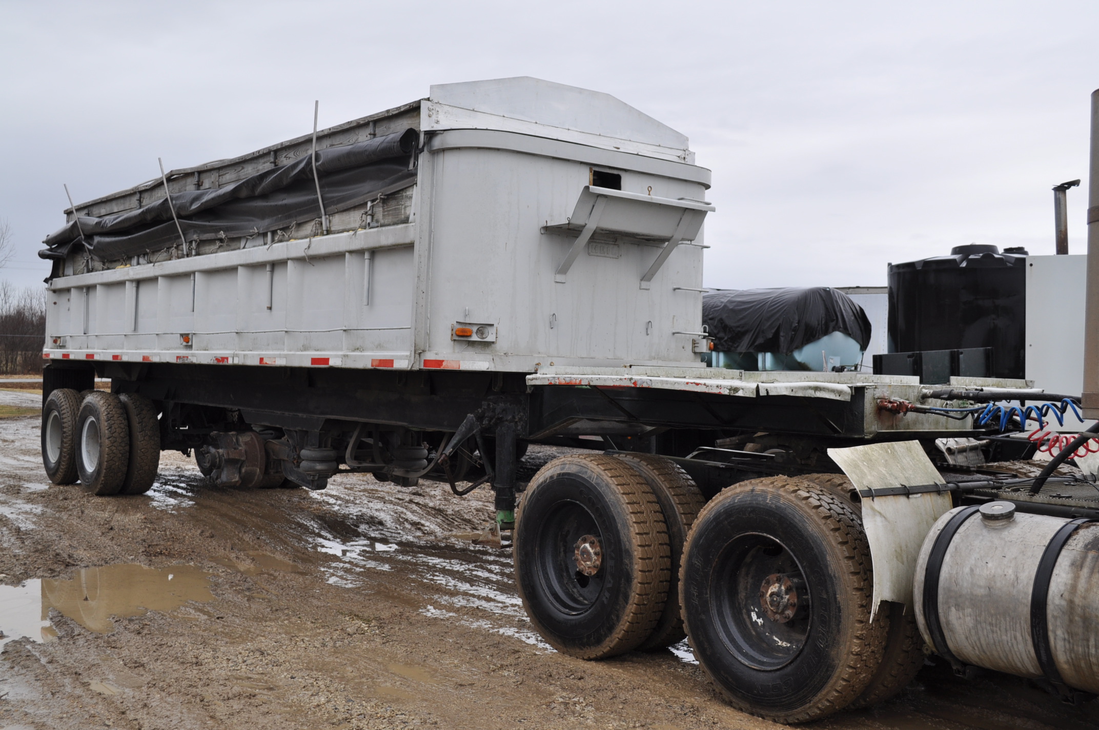 1965 28’ Heil frame dump trailer, dual tandem axle, 3rd axle with air ...