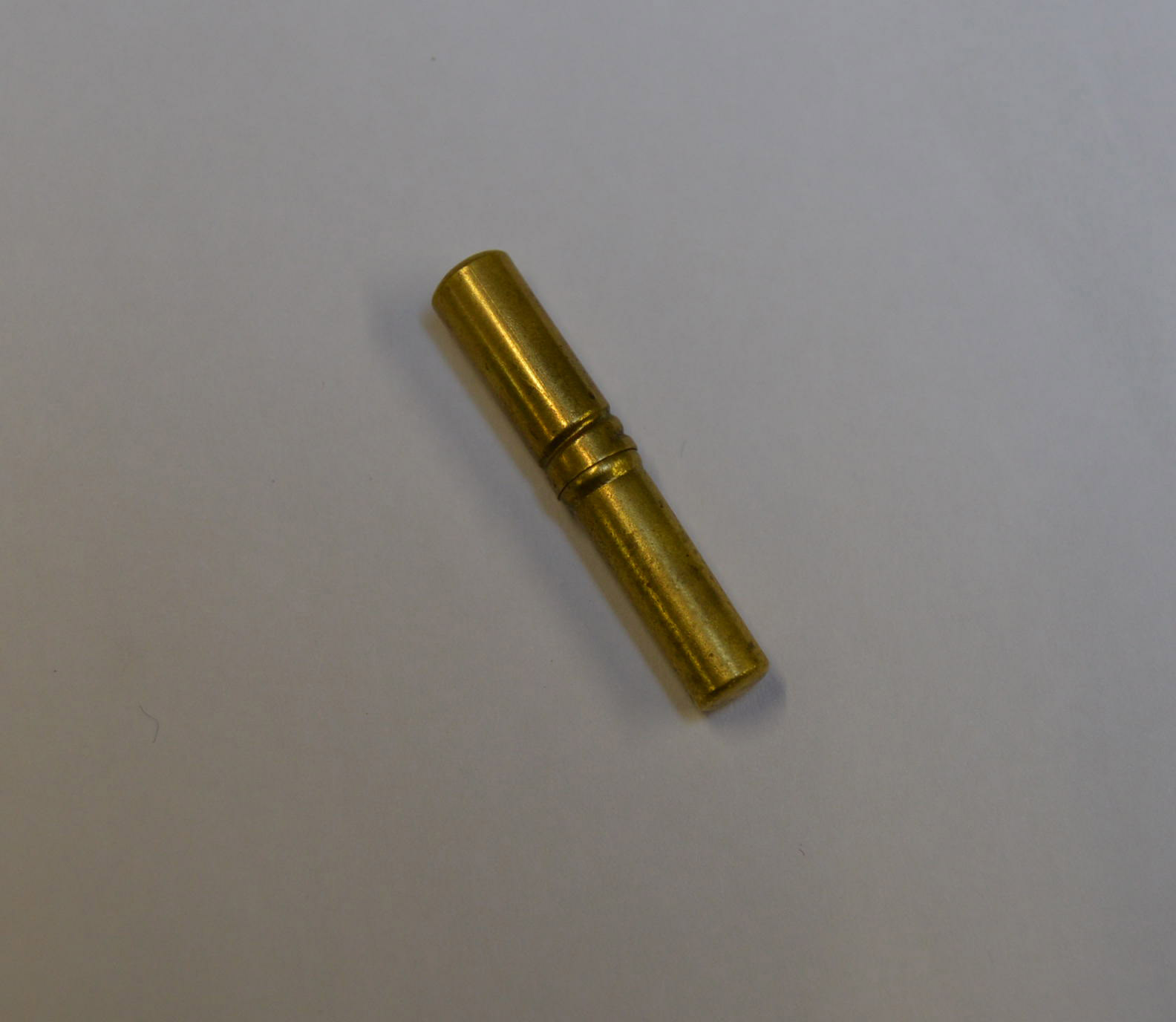 A scarce WW1 era carrier pigeon brass message capsule, empty capsule ...