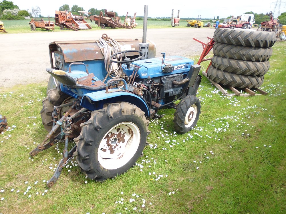 Iseki 2160 4WD compact tractor. With 3 cylinder diesel engine, and gang ...