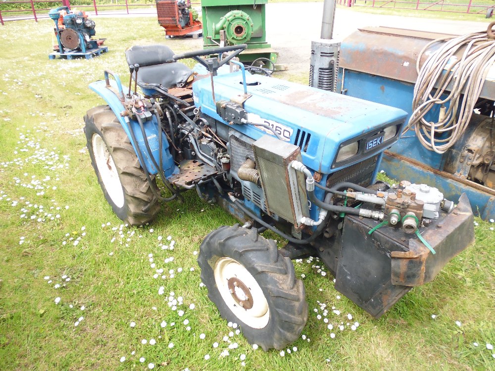 Iseki 2160 4WD compact tractor. With 3 cylinder diesel engine, and gang ...
