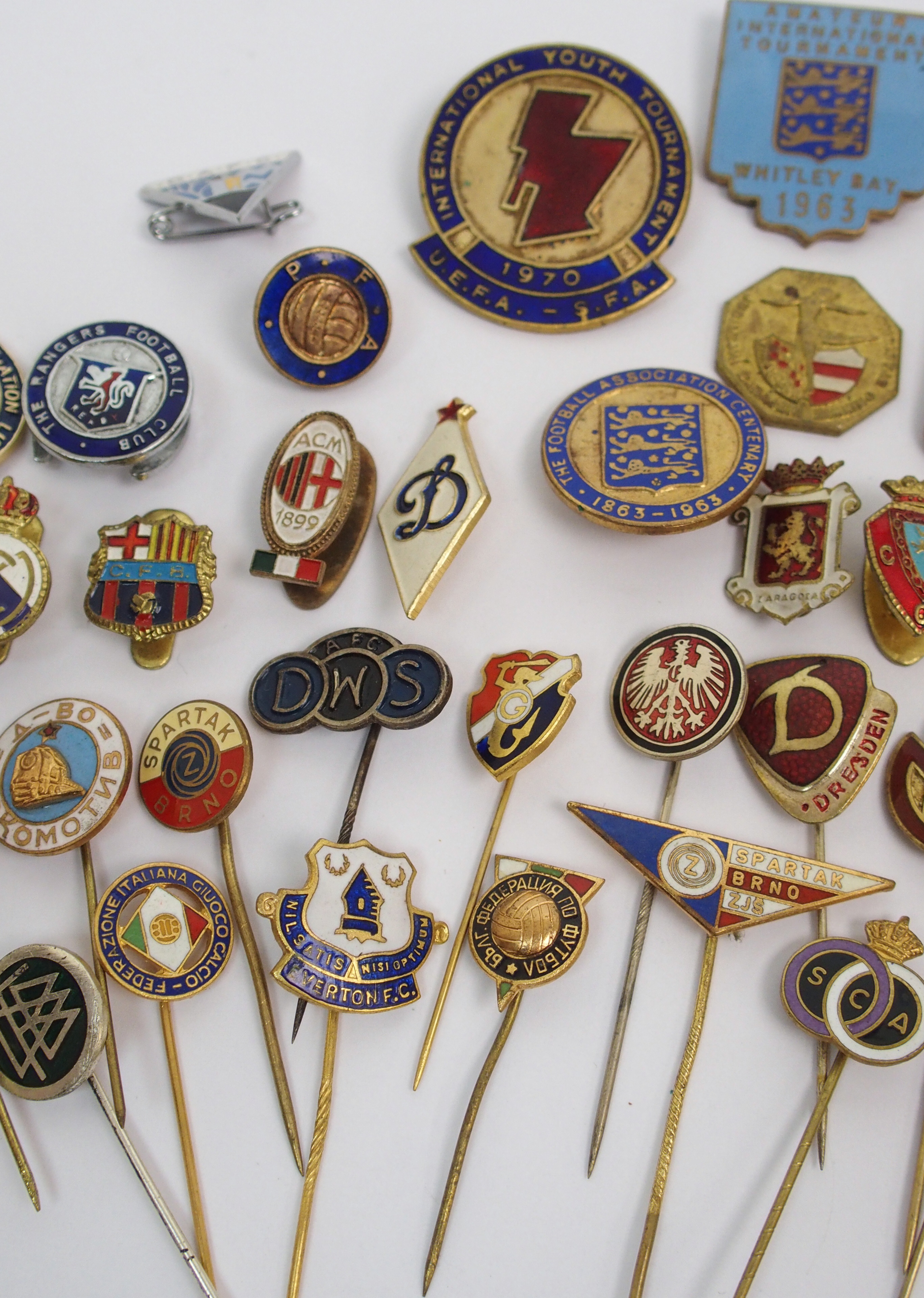A collection of football enamel lapel badges including English and ...