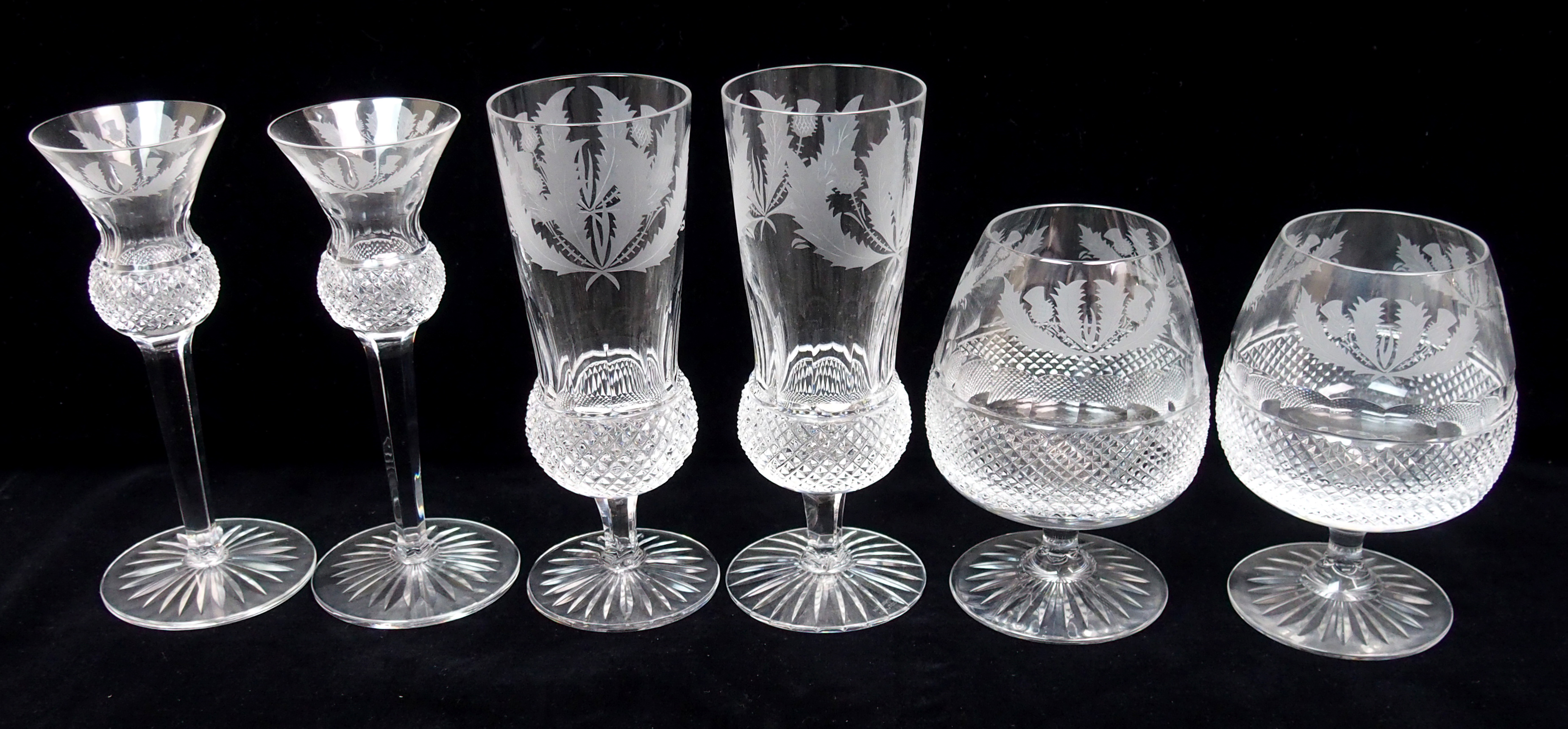 A part suite of Edinburgh crystal Thistle pattern glassware comprising ...