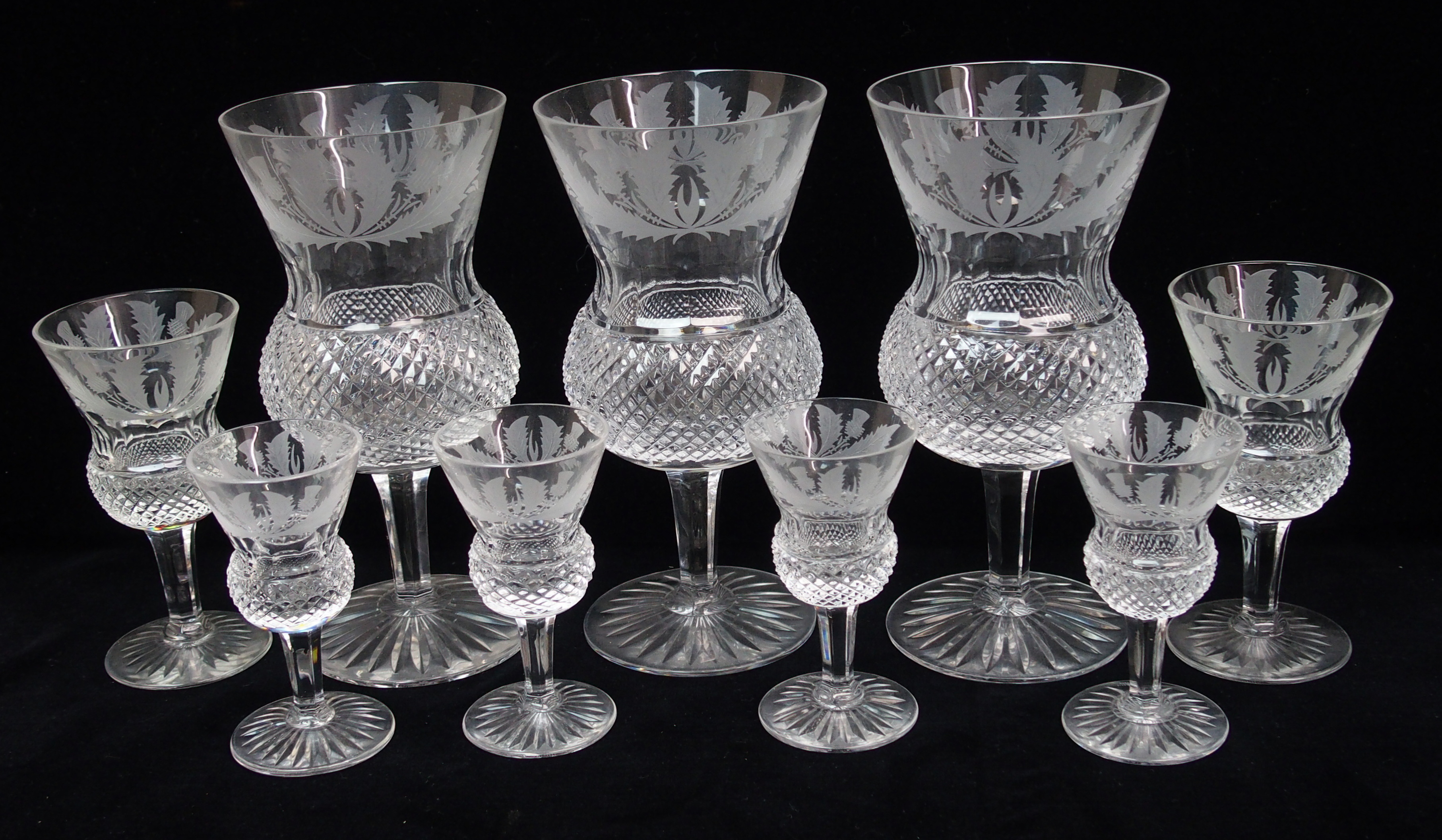 A part suite of Edinburgh crystal Thistle pattern glassware comprising ...