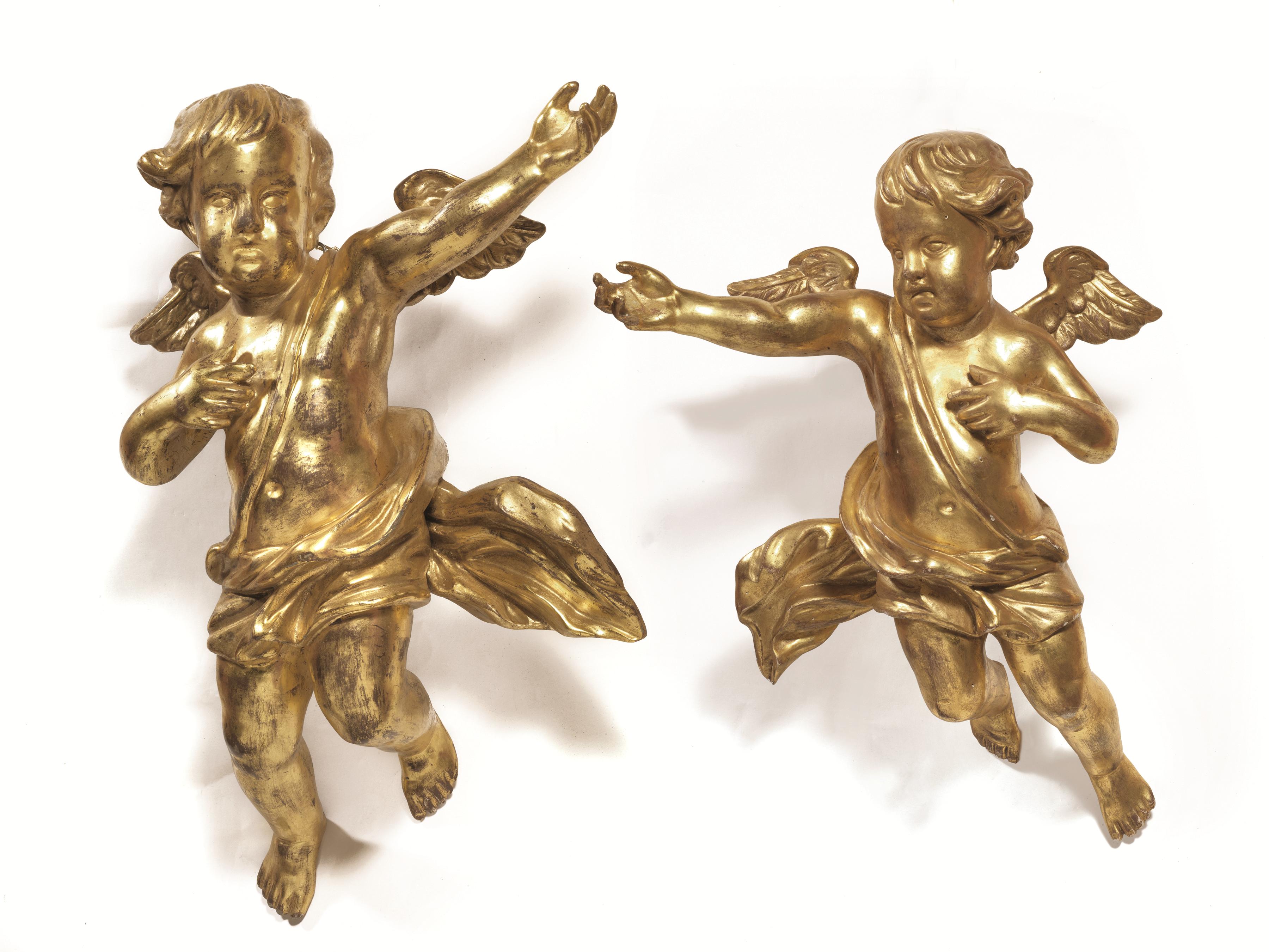 COPPIA DI PUTTI ALATI, FINE SECOLO XIXin legno intagliato e dorato, alt ...
