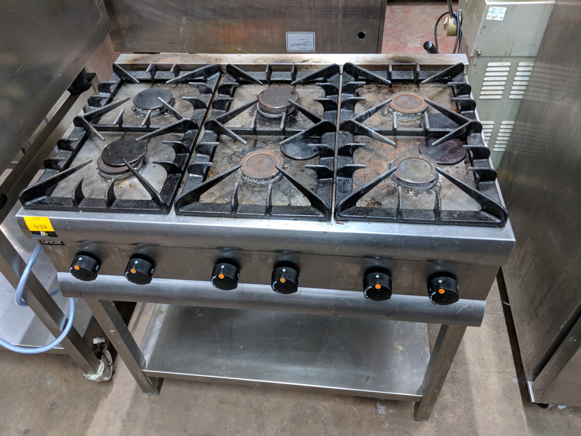Lincat 6-ring gas hob on stainless steel stand incorporating shelf ...