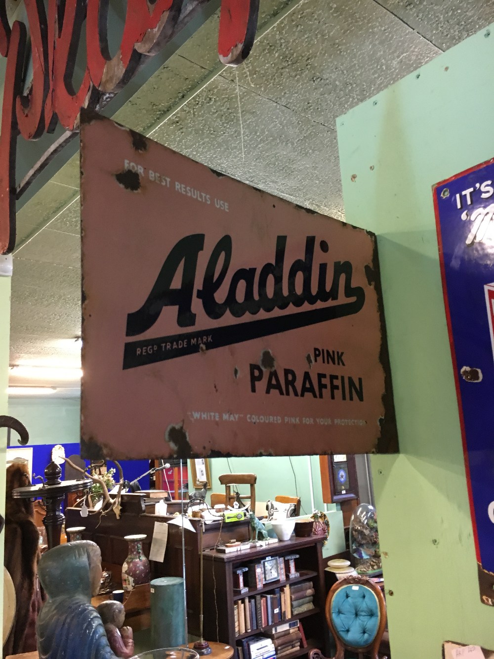 Original double sided ALADDIN Pink Paraffin advertising sign.