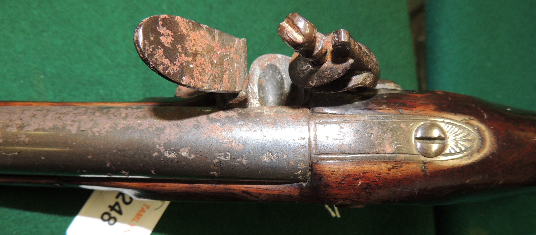 A 19th Century flintlock pistol having fully stocked barrel with proof ...
