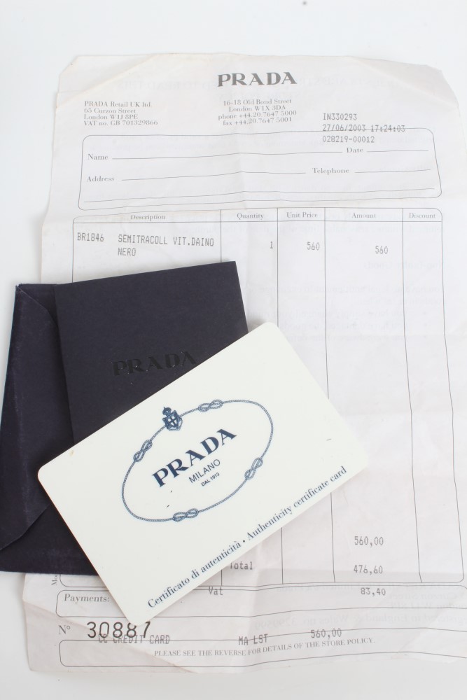 Prada handbag - black leather with buckled handle - with receipt dated ...