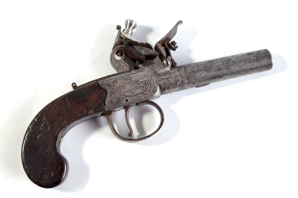 A small flintlock pocket pistol with screw-off barrel, the lock ...