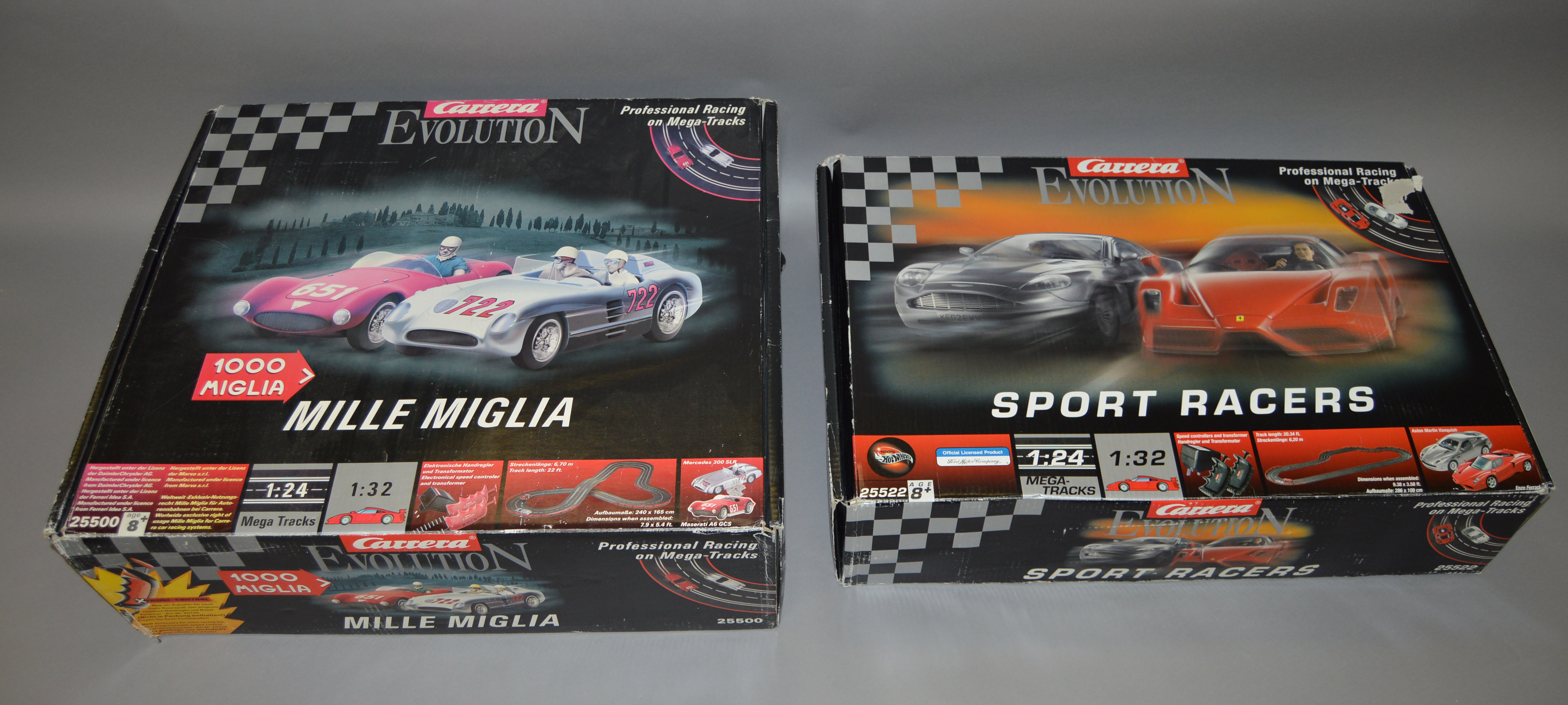 Two Carrera Evolution slot racing sets: 25500 Mille Miglia; 25522 Sport ...