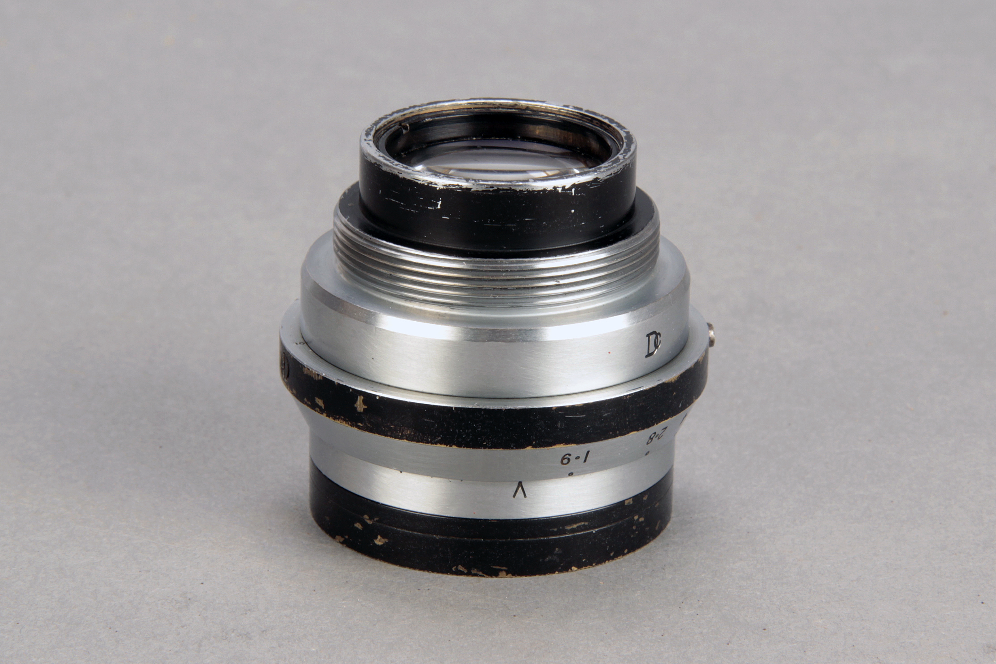 A Dallmeyer Super-Six f/1.9 2½” Lens, chrome, serial no. 350799, body ...