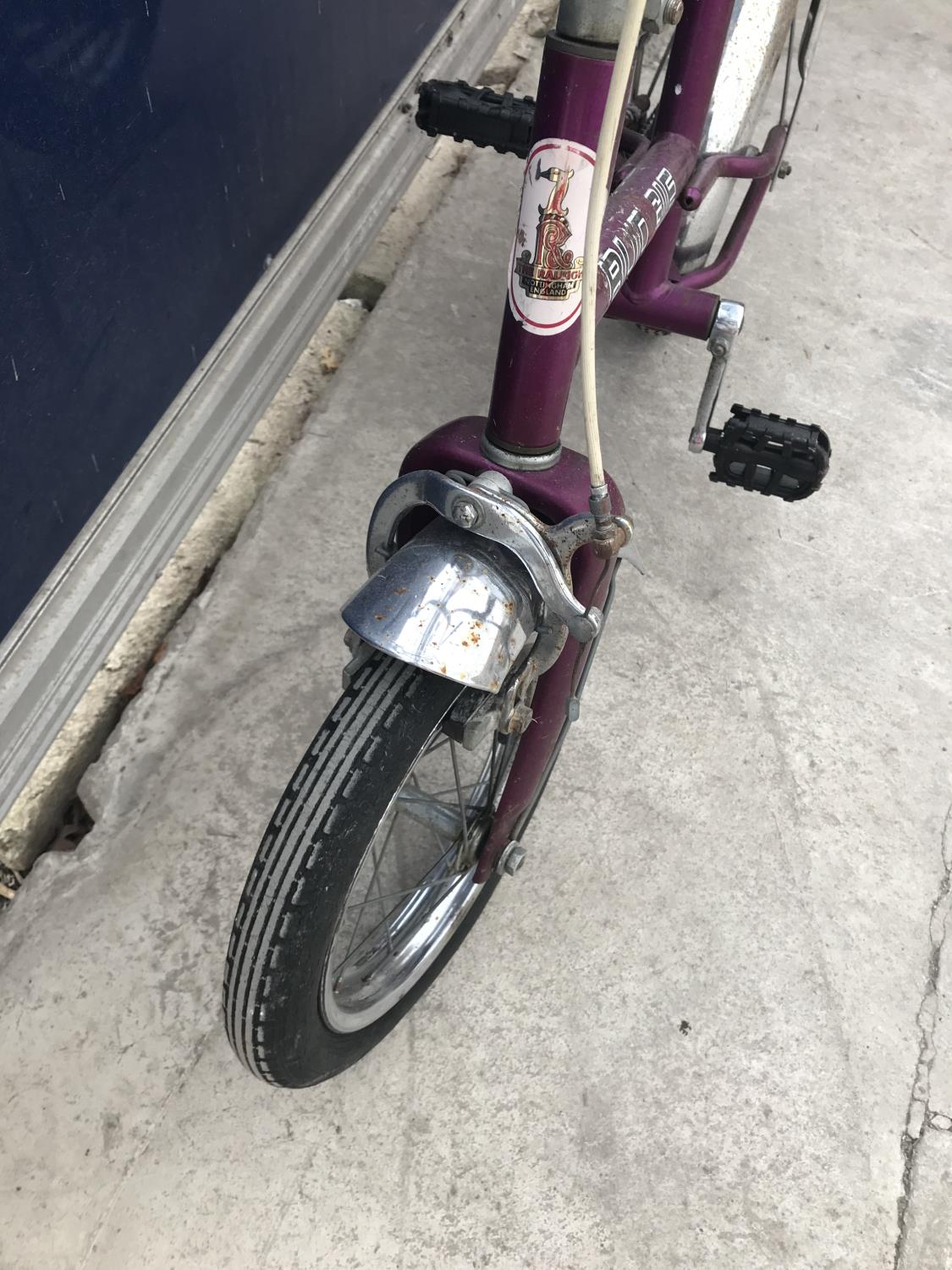 A VINTAGE RALEIGH BUDGIE (MINI CHOPPER STYLE) PURPLE BICYCLE