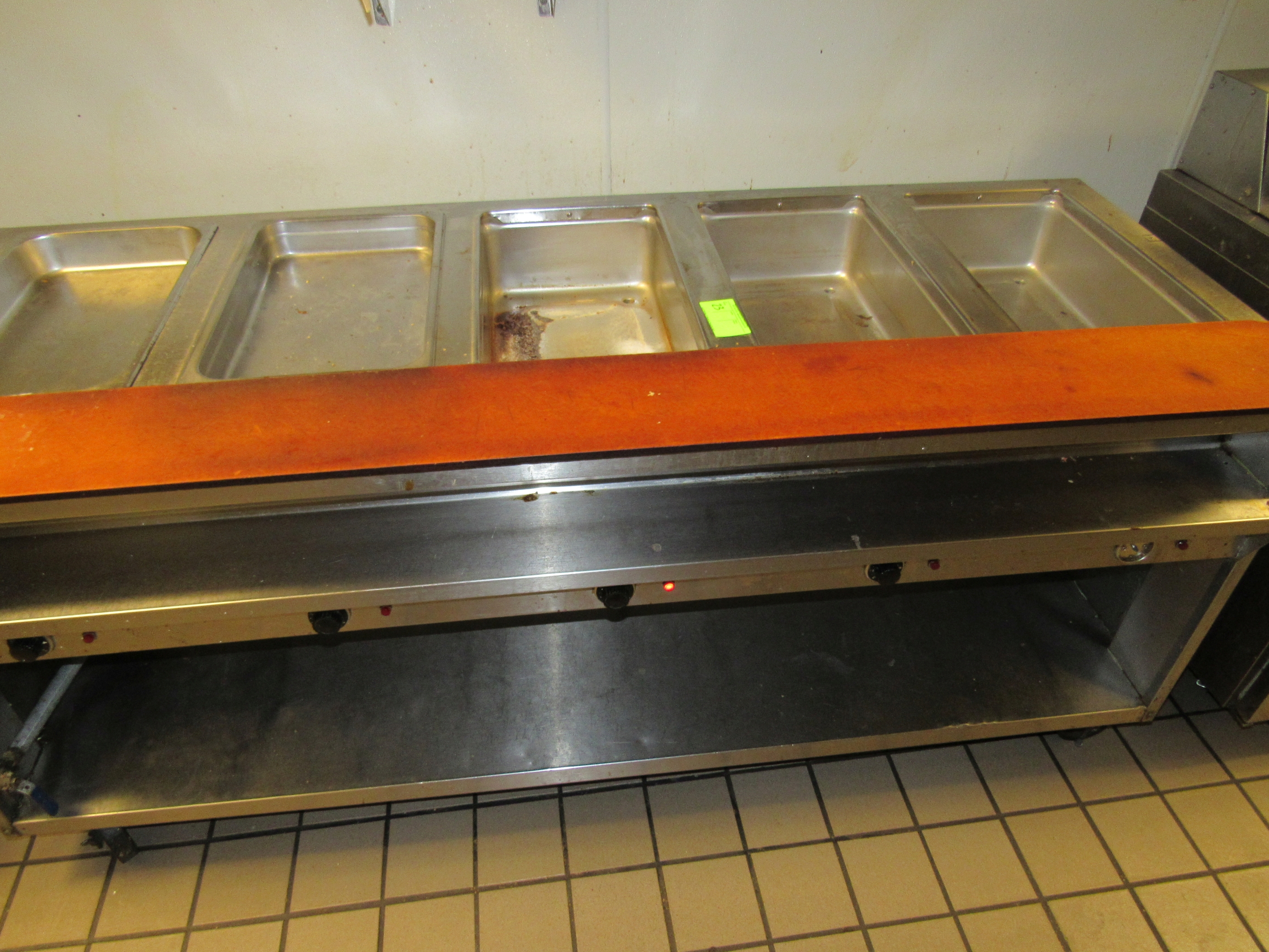 Five-compartment electric steam table with cutting board and under ...