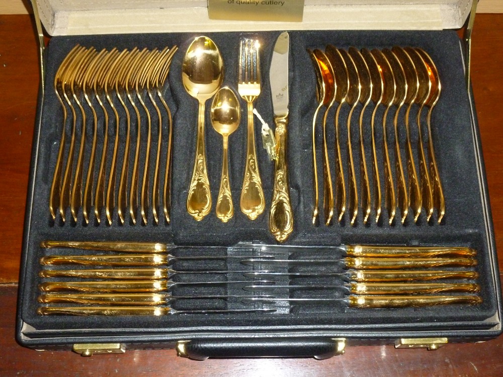 BESTECKE SOLINGEN, CASED SET OF GOLD PLATED CUTLERY