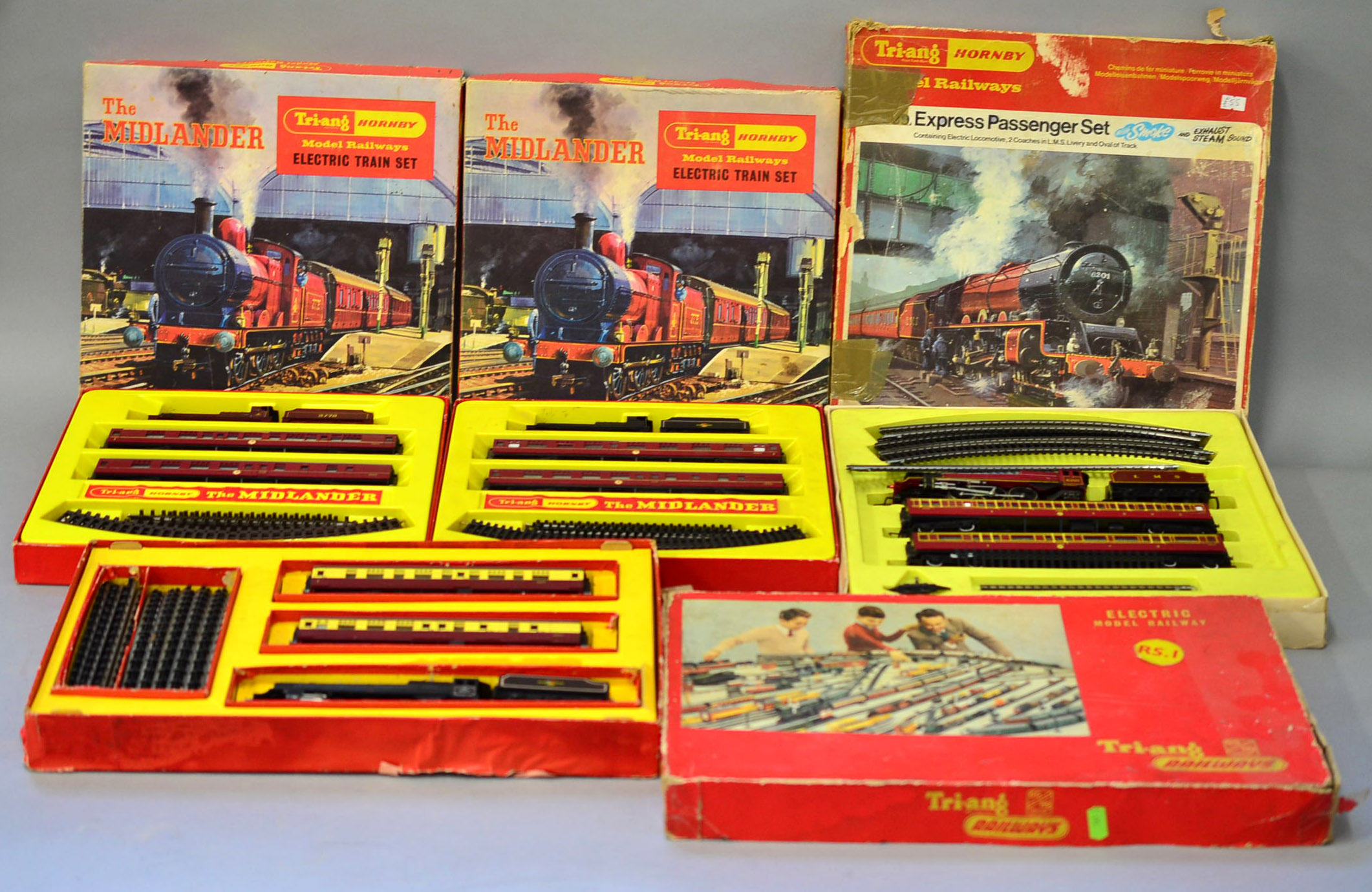 O gauge. Four Triang Hornby train sets: RS1; two RS8; RS609. In P-F ...
