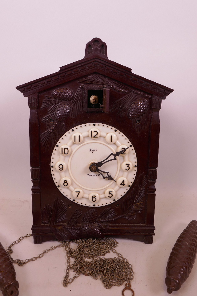 A Russian bakelite cuckoo clock, 8½" x 12"