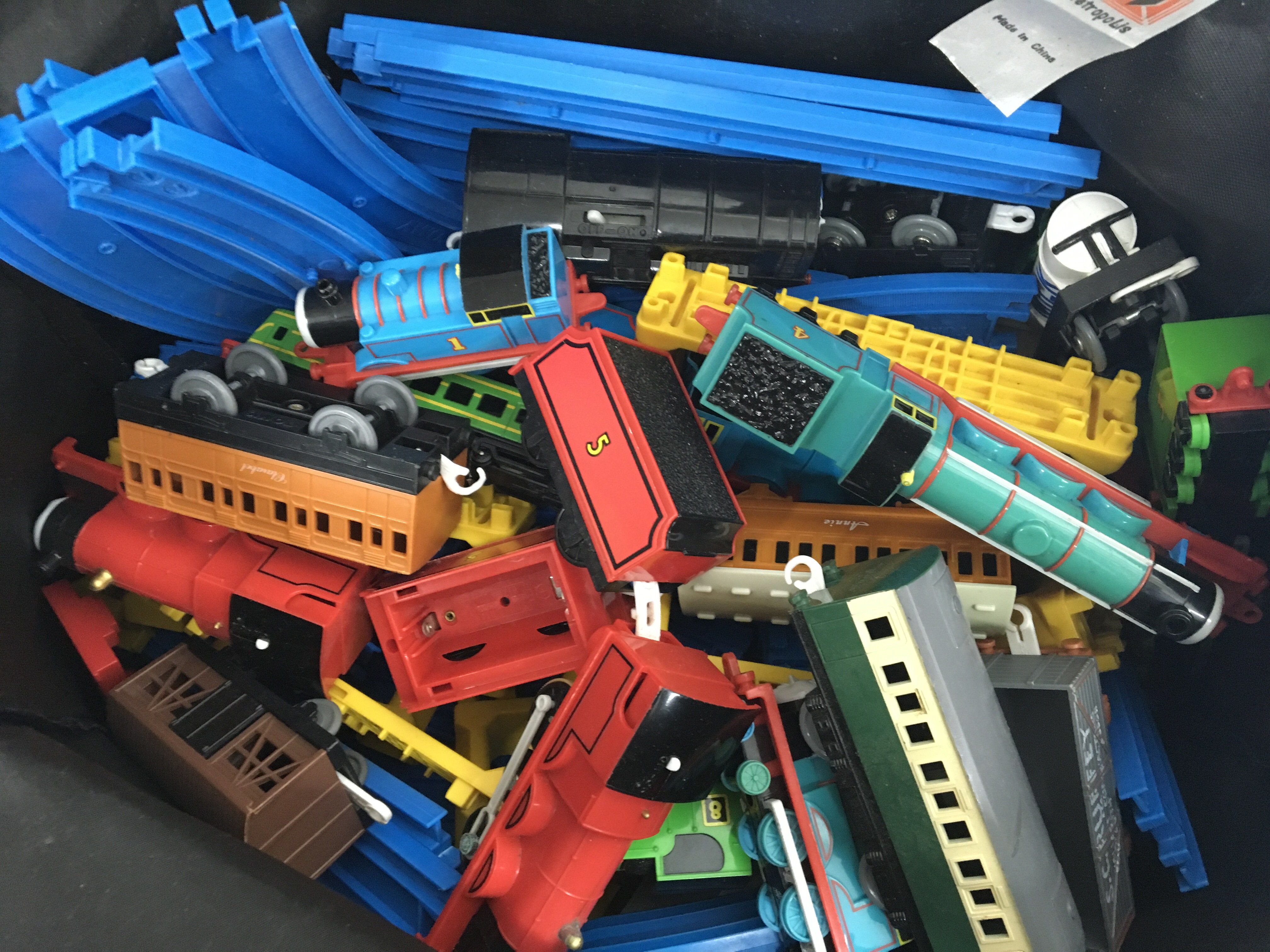 A collection of 'Thomas The Tank Engine' engines, carriages, trucks and ...